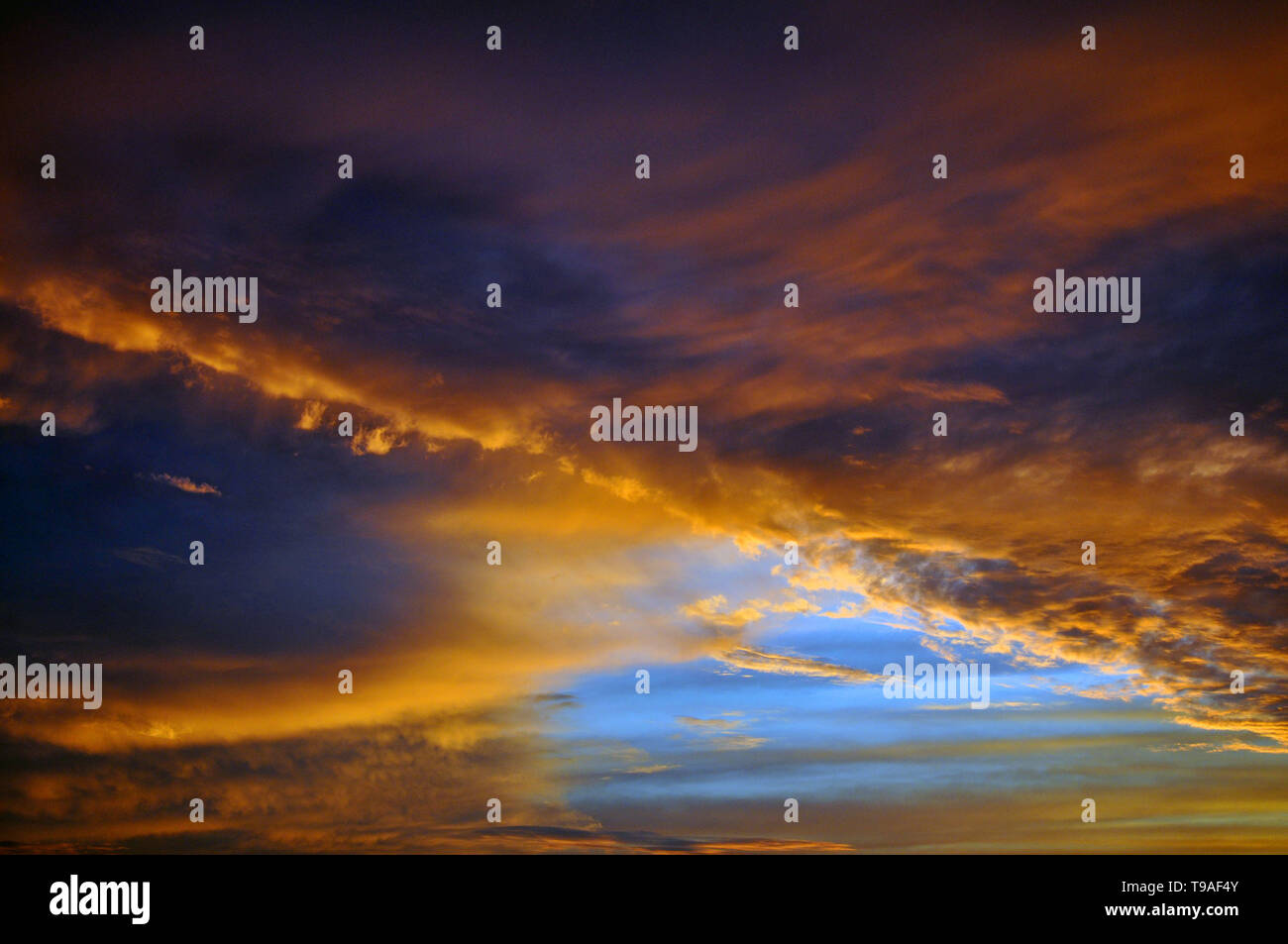 Dramatic sunset, red sky. After the rain Texture Stock Photo - Alamy