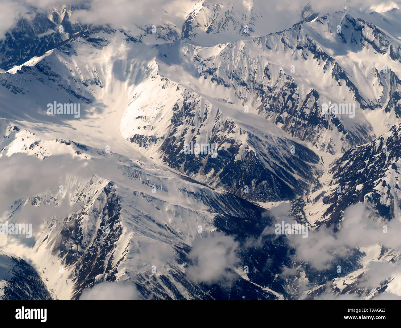 Flight over the Italian Alps with a wonderful aerial view Stock Photo ...