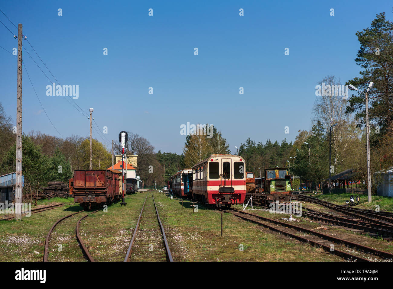 Rusty, old freight cars and locomotive Stock Photo - Alamy