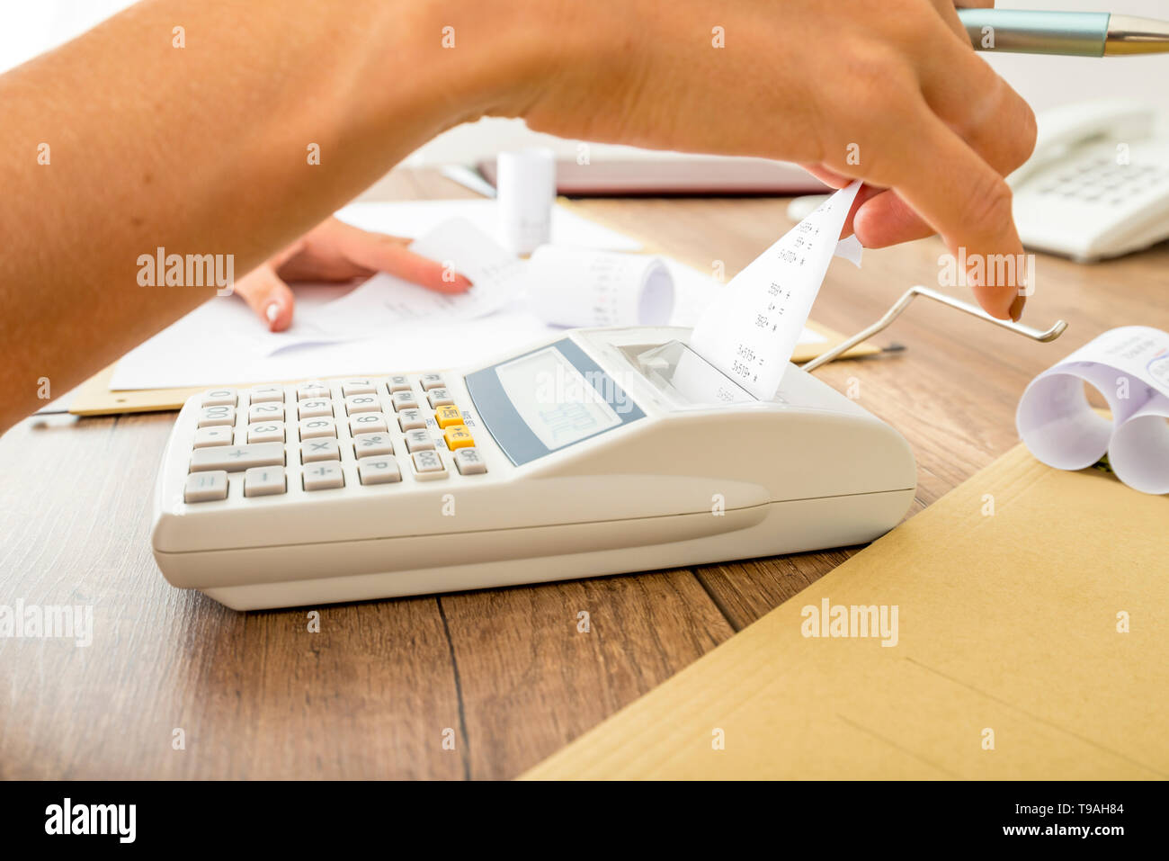 Adding machine tape hi-res stock photography and images - Alamy
