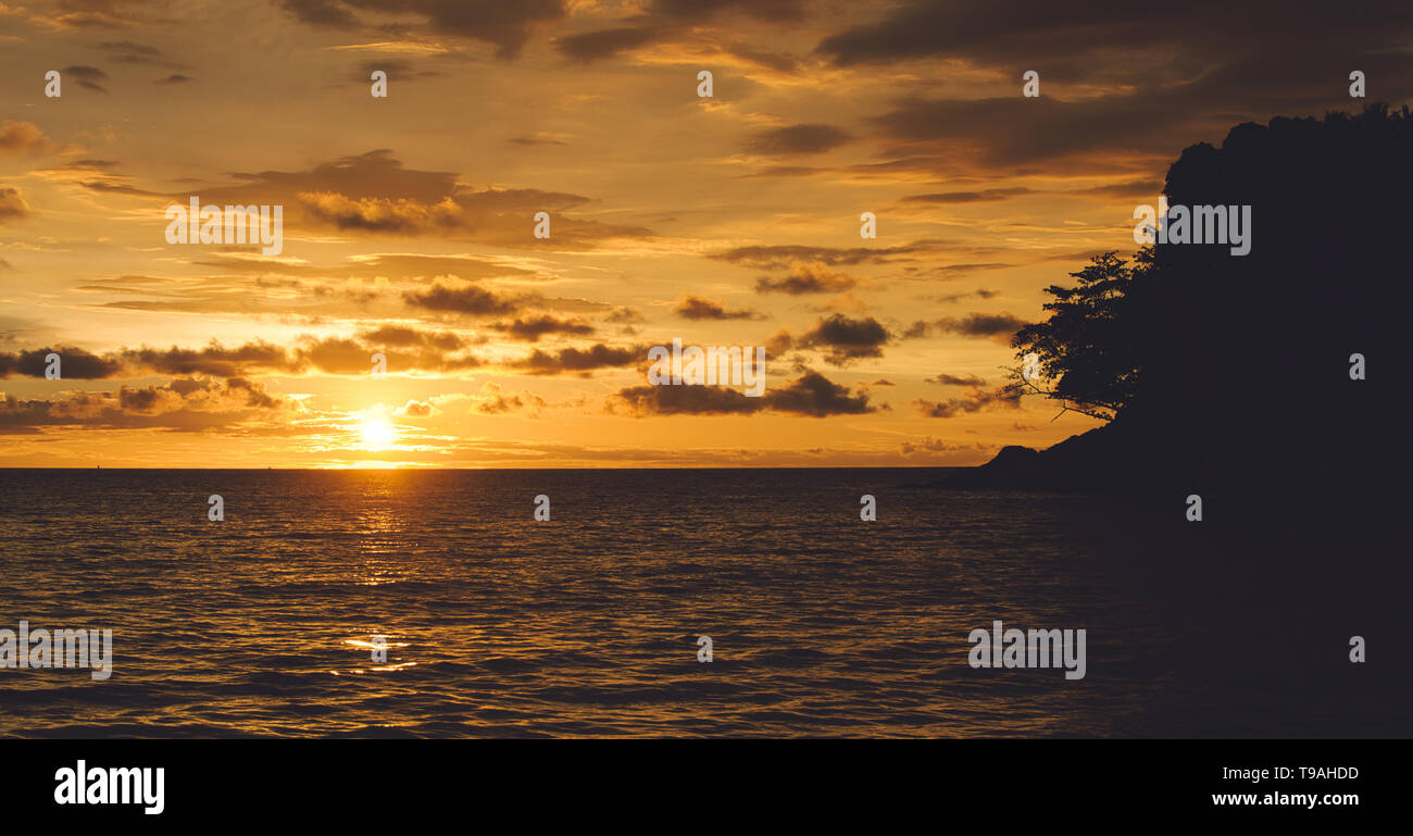 Orange sunset in Thailand Stock Photo - Alamy