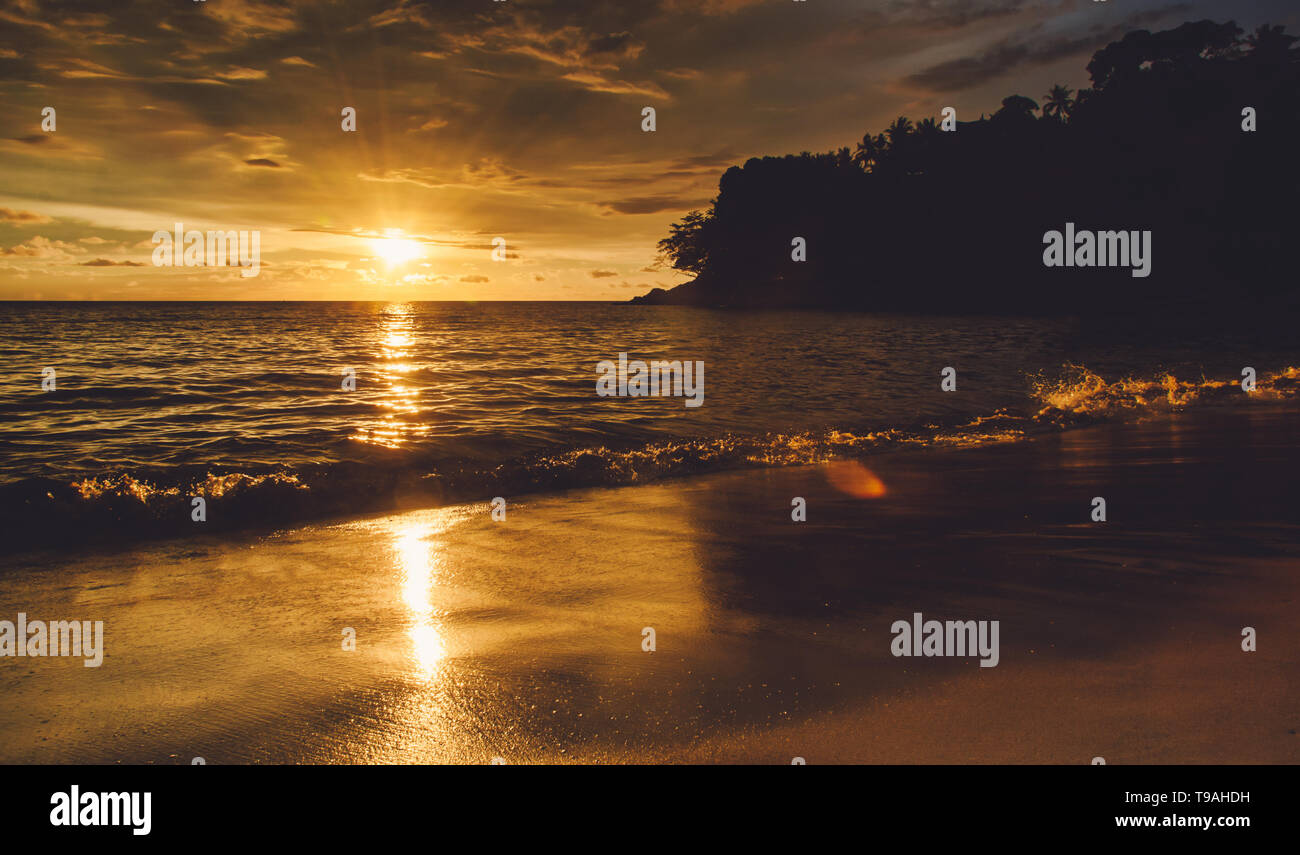 Orange sunset in Thailand Stock Photo - Alamy