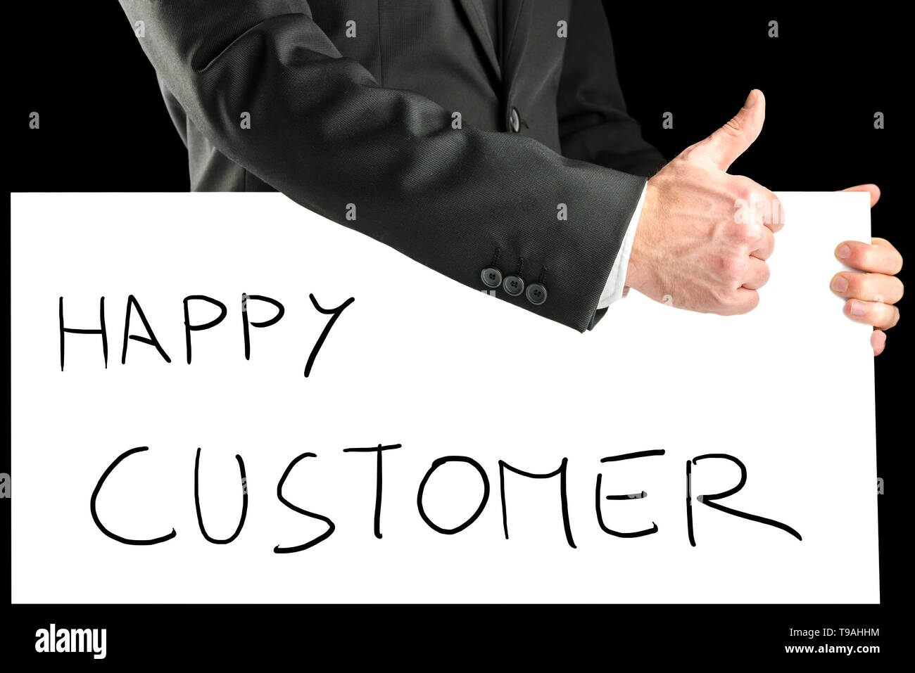 Businessman with a hand written sign saying - Happy customer - giving a ...