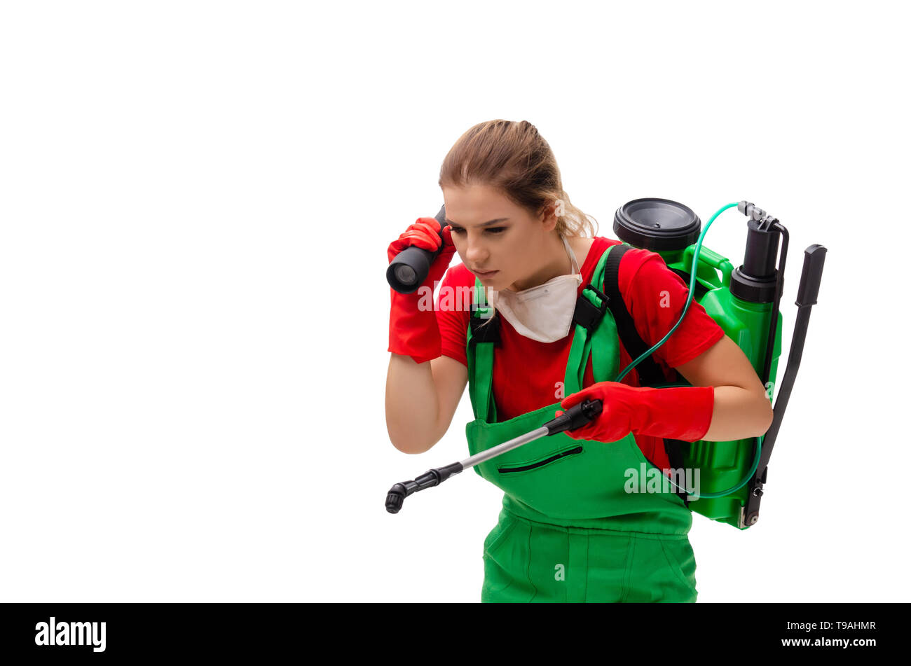 Female pest control contractor isolated on white Stock Photo - Alamy
