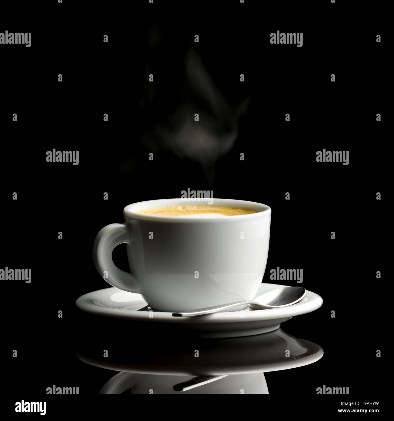 Cup of fresh hot coffee over black background Stock Photo - Alamy
