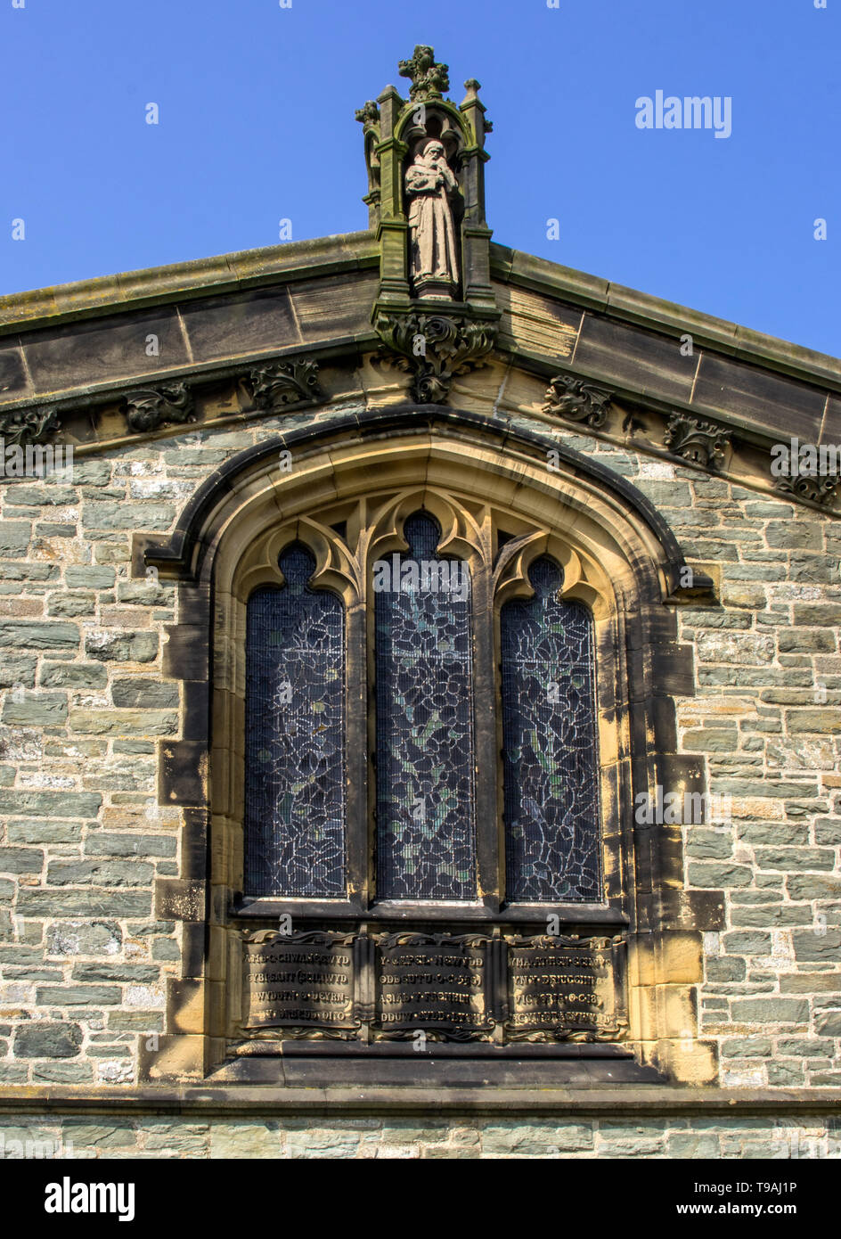 A window on the Chancel of St Cybi's Church, Holyhead Stock Photo - Alamy
