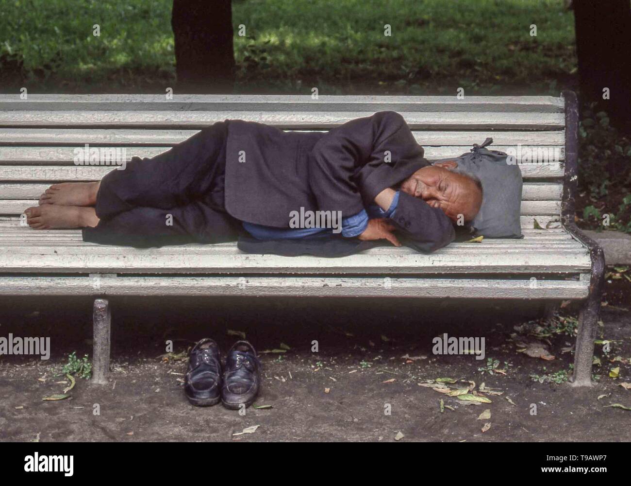 Barefoot homeless man hi-res stock photography and images - Alamy