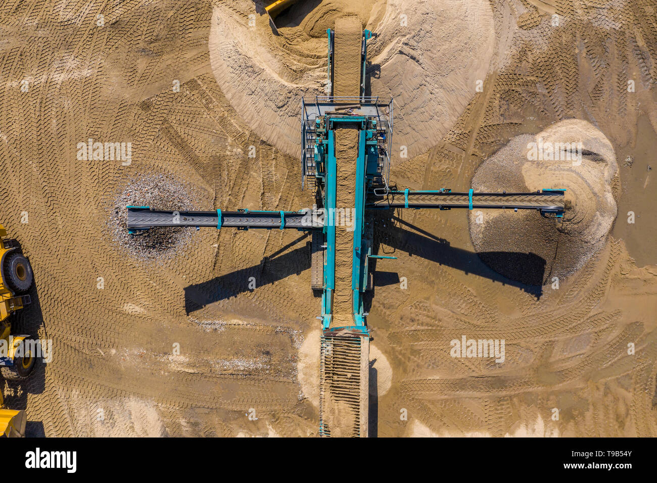 Aerial view of crushed stone quarry machine Stock Photo - Alamy