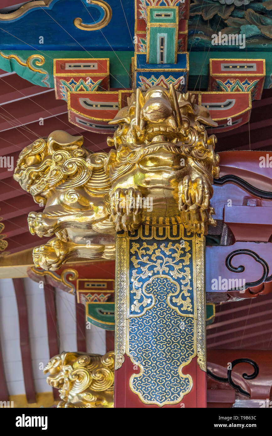 Wooden carved Shishi Lion and Baku Tapir Nosing golden ornaments at ...