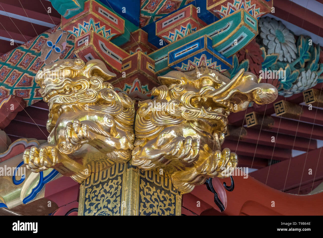 Wood carved Shishi Lion and Baku Tapir Nosing golden ornaments at ...