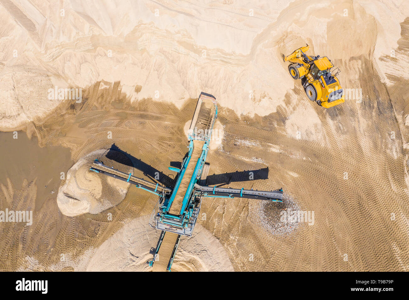Aerial view of crushed stone quarry machine Stock Photo - Alamy