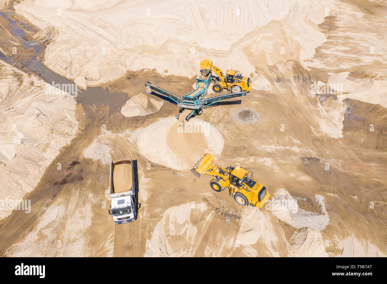 Aerial view of crushed stone quarry machine Stock Photo - Alamy