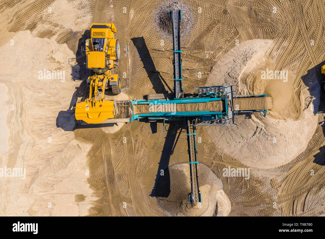 Aerial view of crushed stone quarry machine Stock Photo - Alamy