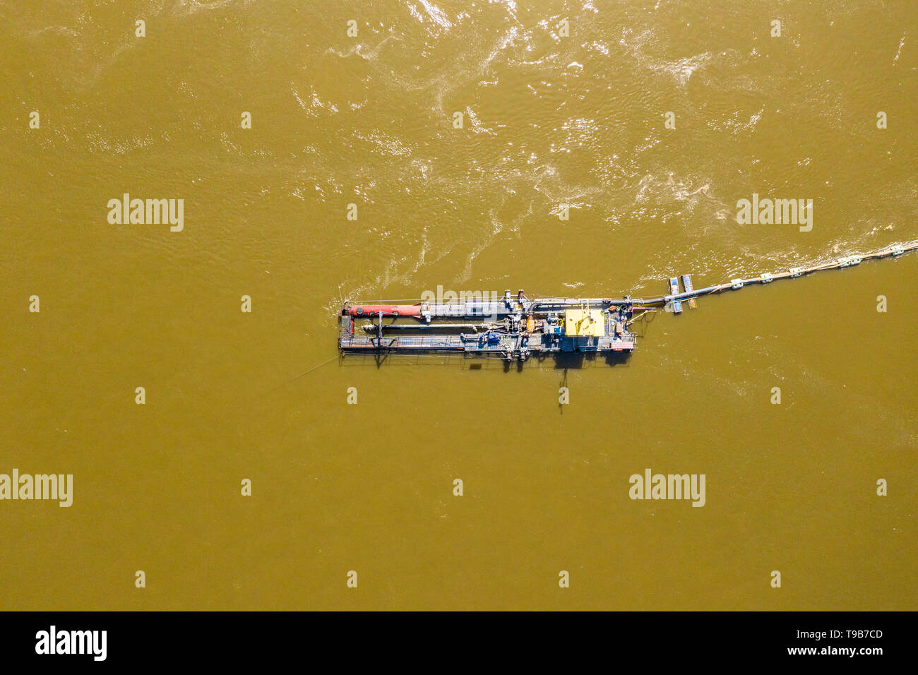 Water pump on the river bank on a big boat. Aerial view Stock Photo - Alamy
