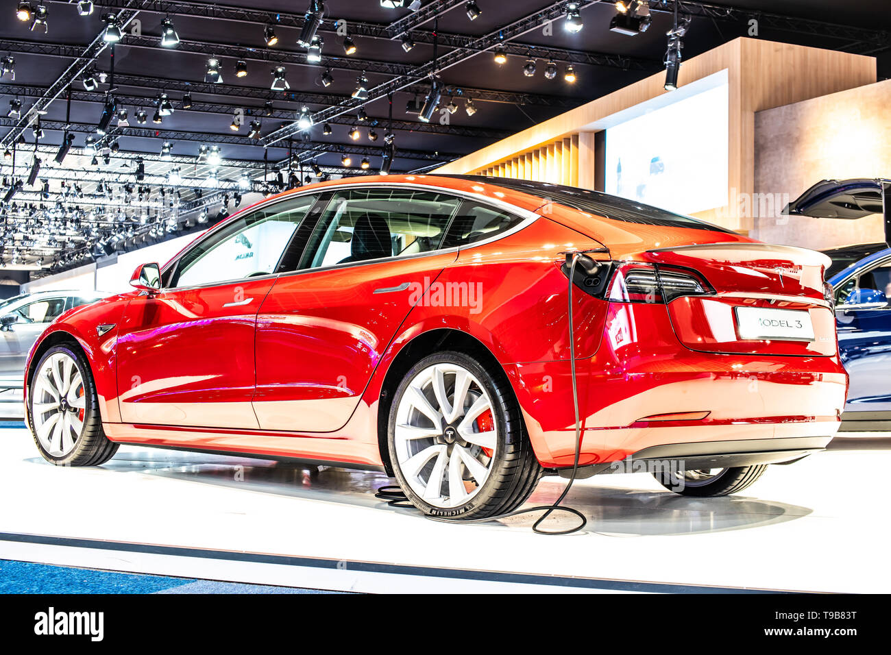 Brussels, Belgium, Jan 21, 2019: metallic red Tesla Model 3 at Brussels ...