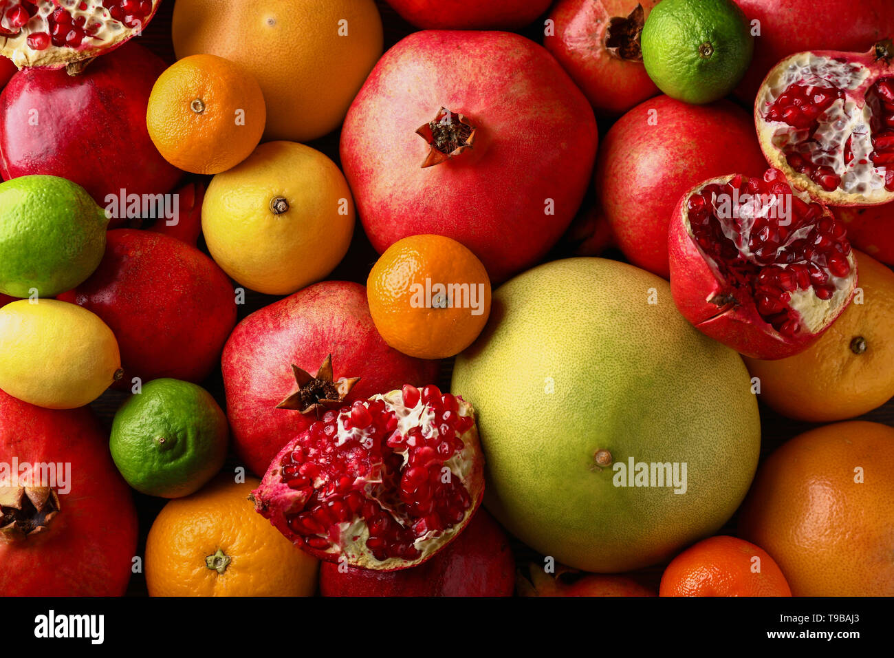 Different ripe fruits as background Stock Photo - Alamy