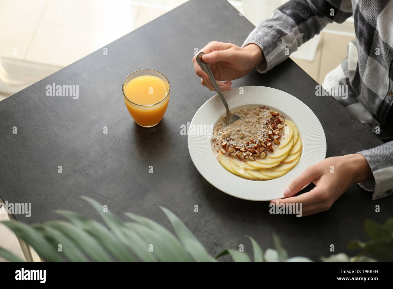 Woman eating all bran breakfast cereal hi-res stock photography and ...