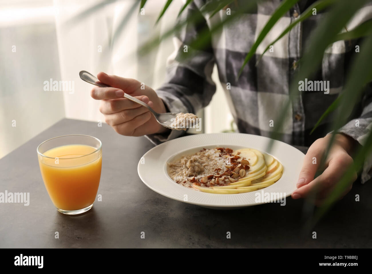 Woman eating all bran breakfast cereal hi-res stock photography and ...