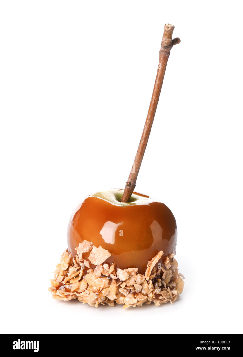 Delicious caramel apple with tree branch on white background Stock ...