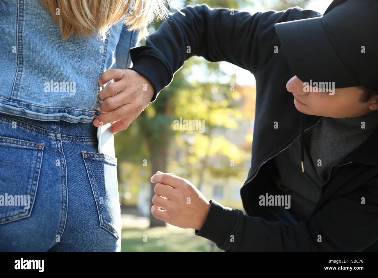 Thief Stealing Mobile Phone From High Resolution Stock Photography and ...