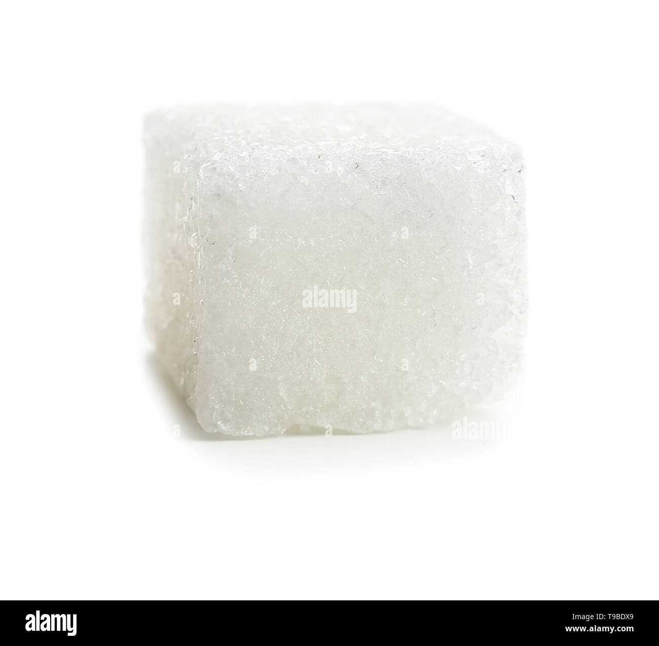 Sugar cube on white background Stock Photo - Alamy
