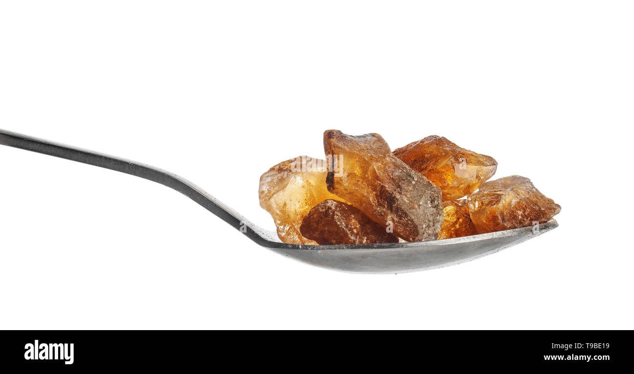 Spoon with sugar pieces on white background Stock Photo - Alamy
