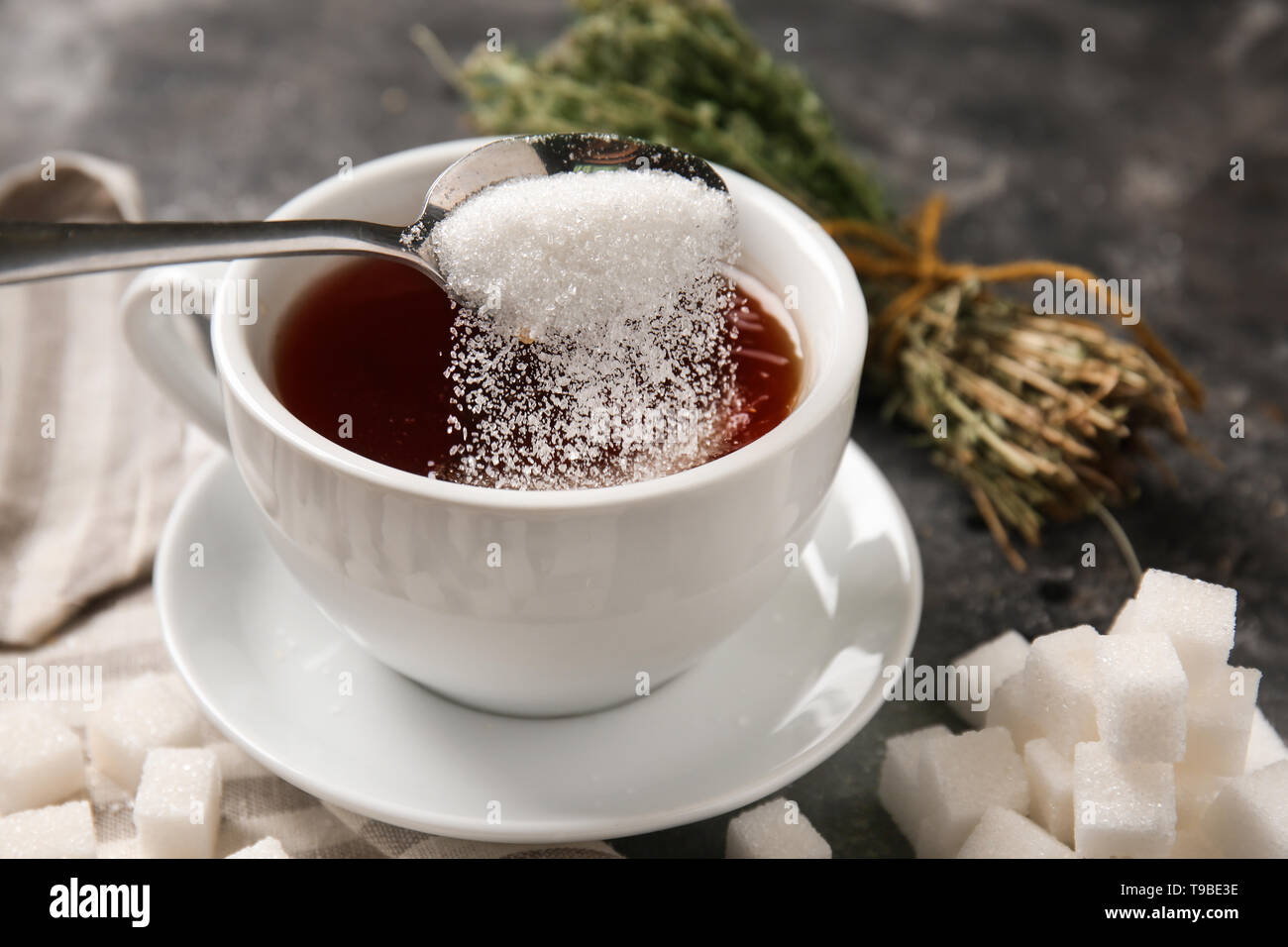 Sugar Spoon Tea Adding Stock Photos & Sugar Spoon Tea Adding Stock ...