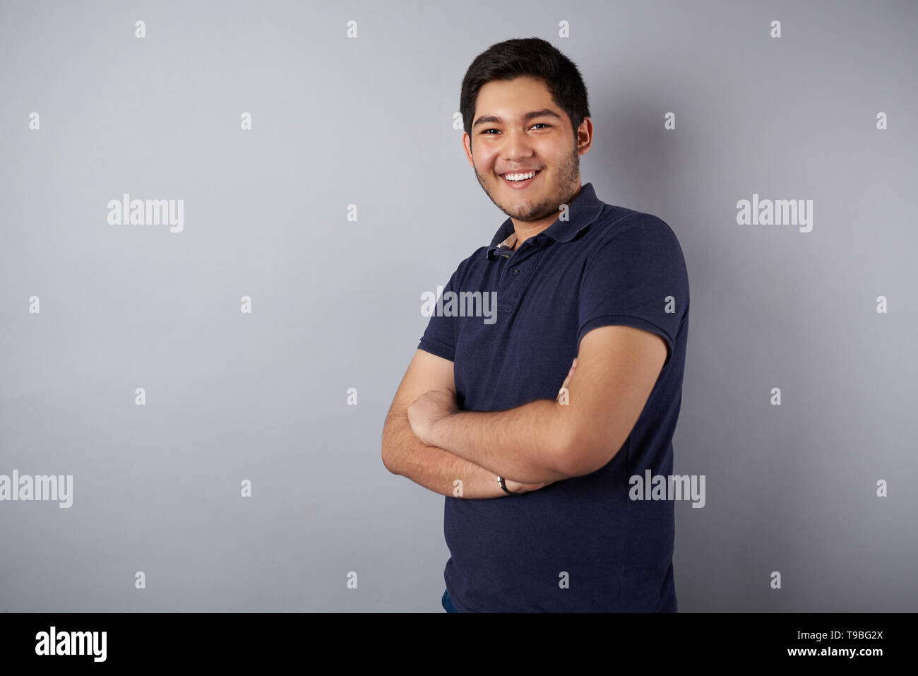 Cool man crossed arms hi-res stock photography and images - Alamy
