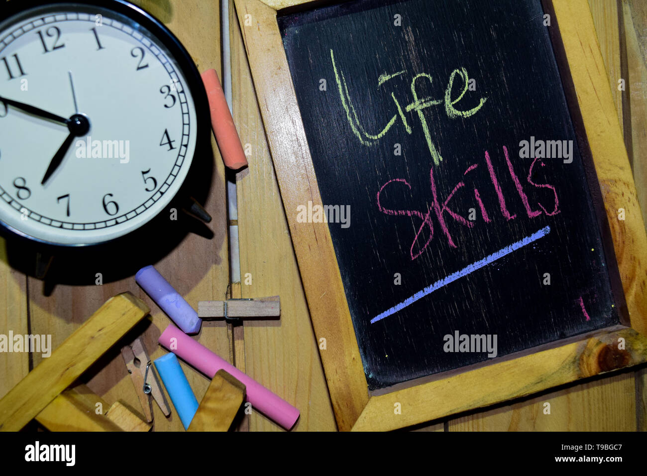 Life Skills on phrase colorful handwritten on chalkboard and alarm ...