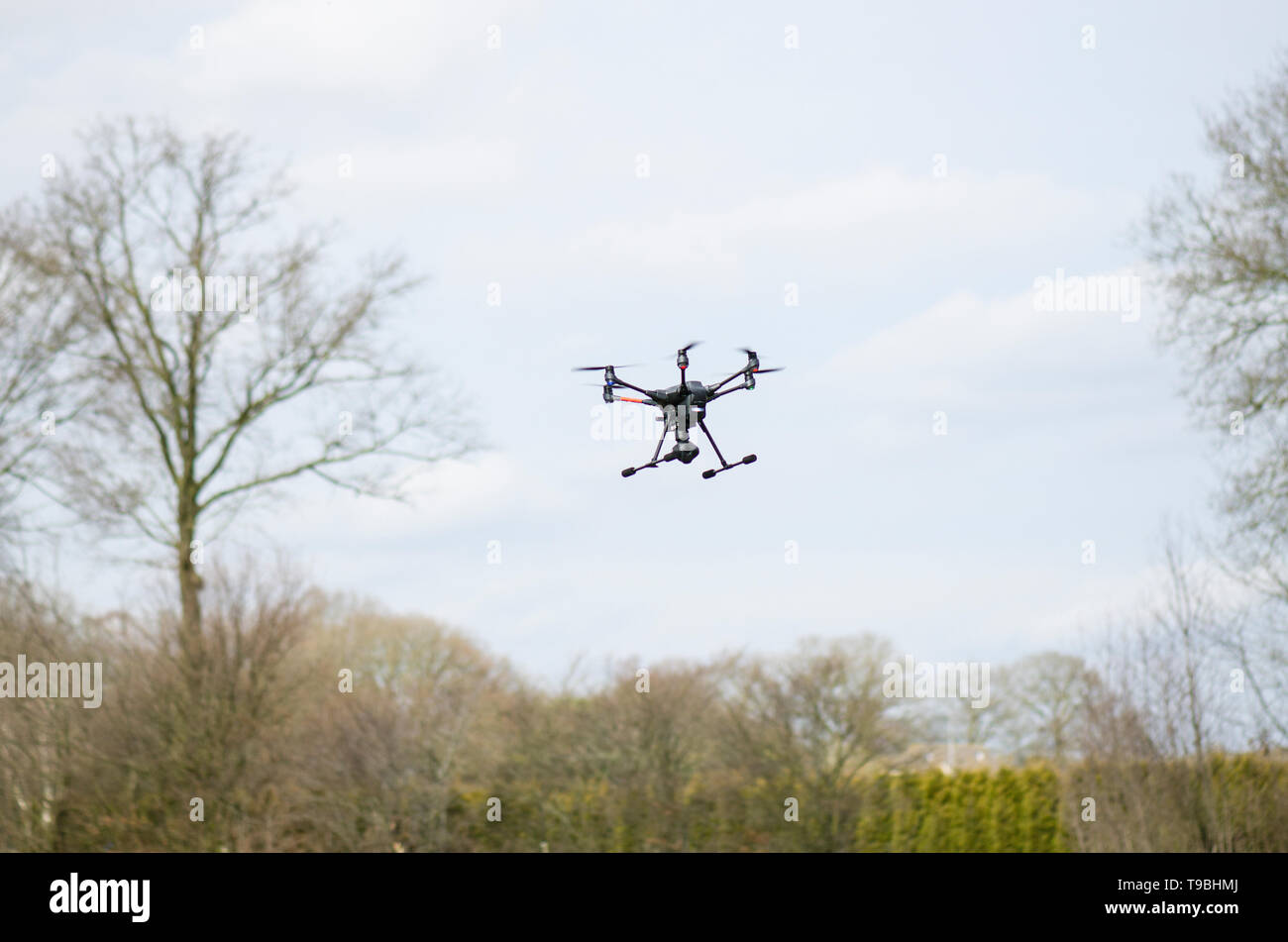 Flying drone camera between trees hi-res stock photography and images ...