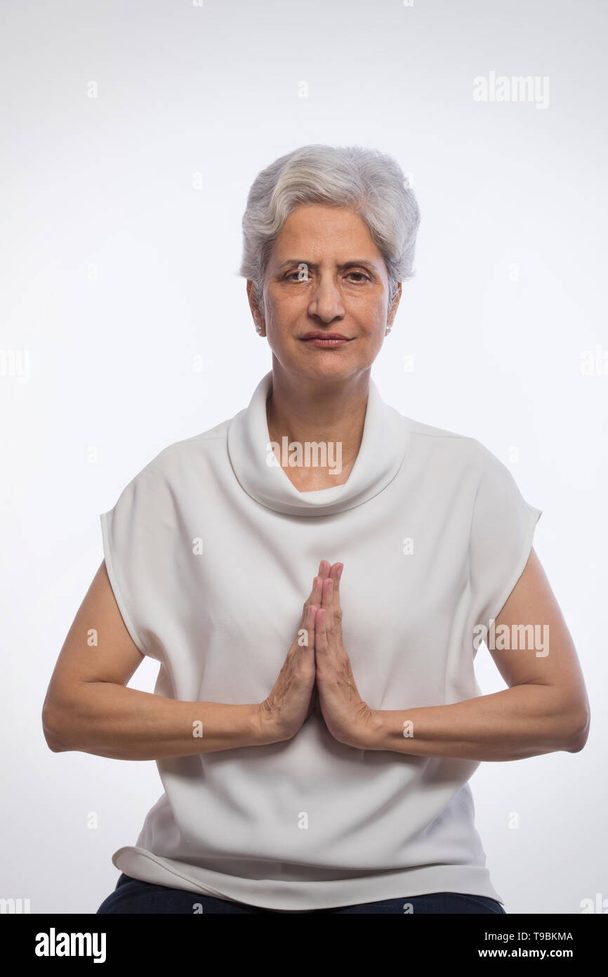 One woman praying looking up hi-res stock photography and images - Alamy