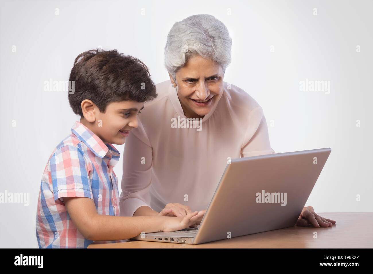 Grandmother grandson laptop hi-res stock photography and images - Alamy