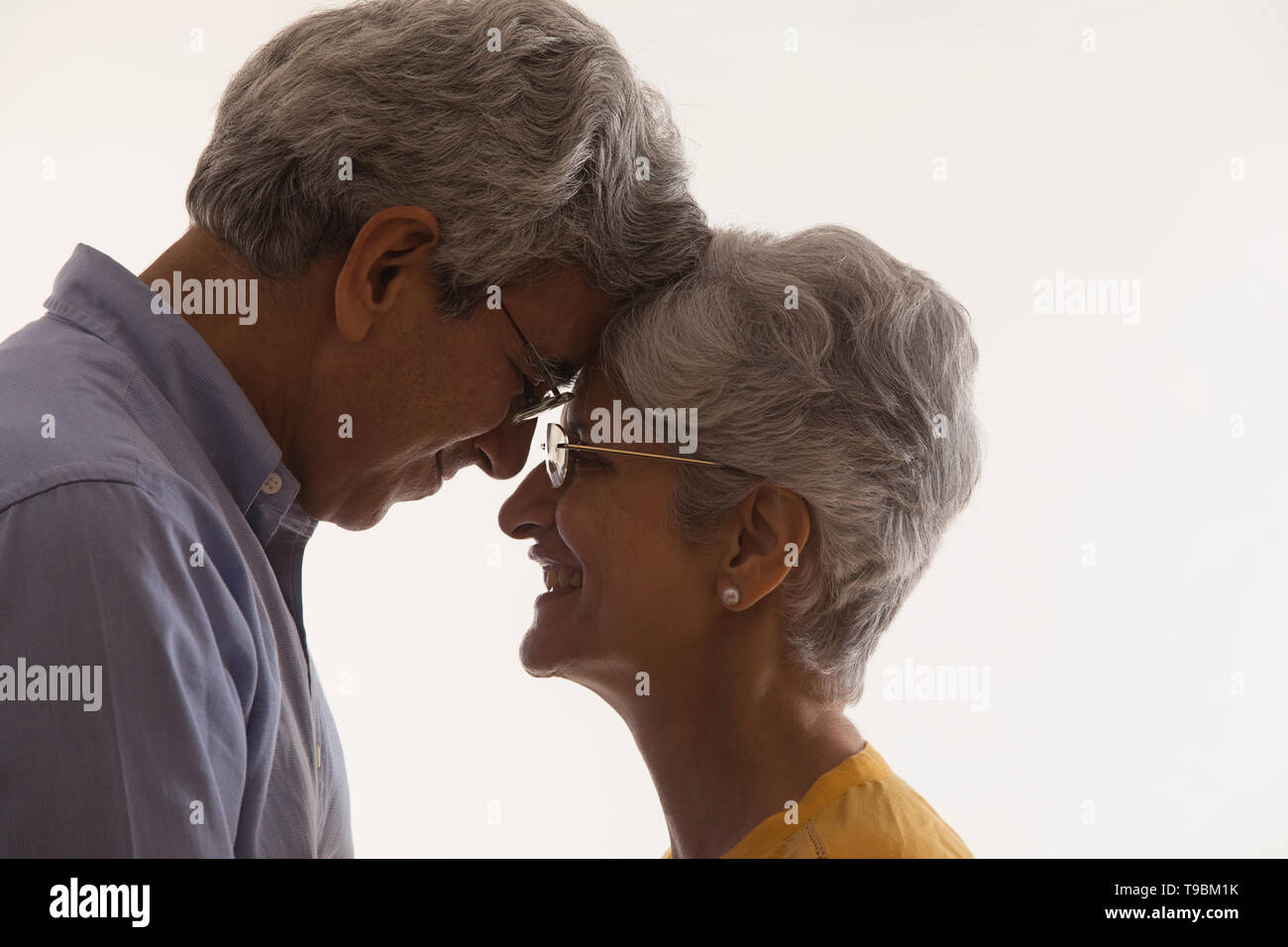 Man and woman foreheads touching hi-res stock photography and images ...
