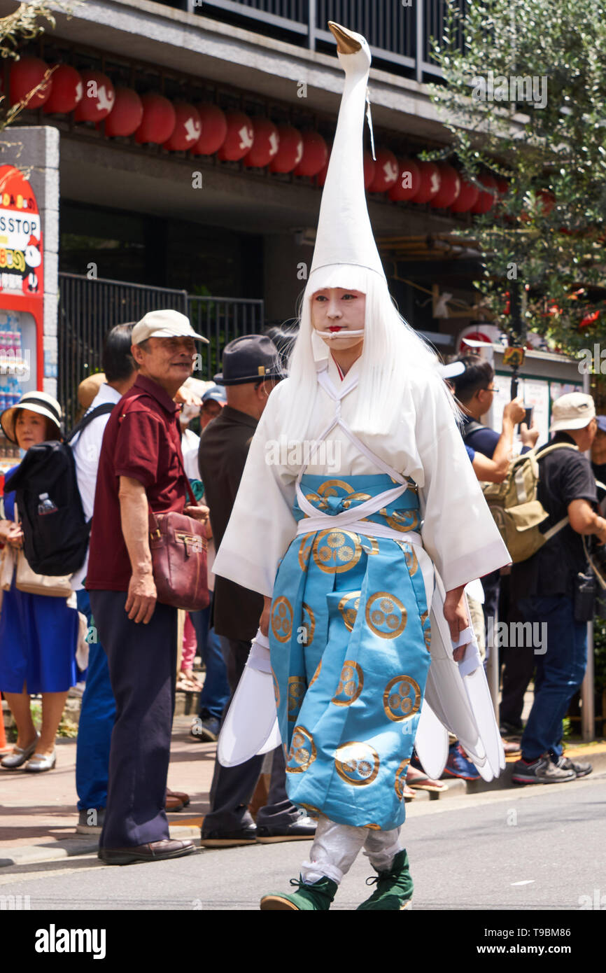 Young Japanese woman dressed as egret (白鷺, shirasagi) with white wig ...