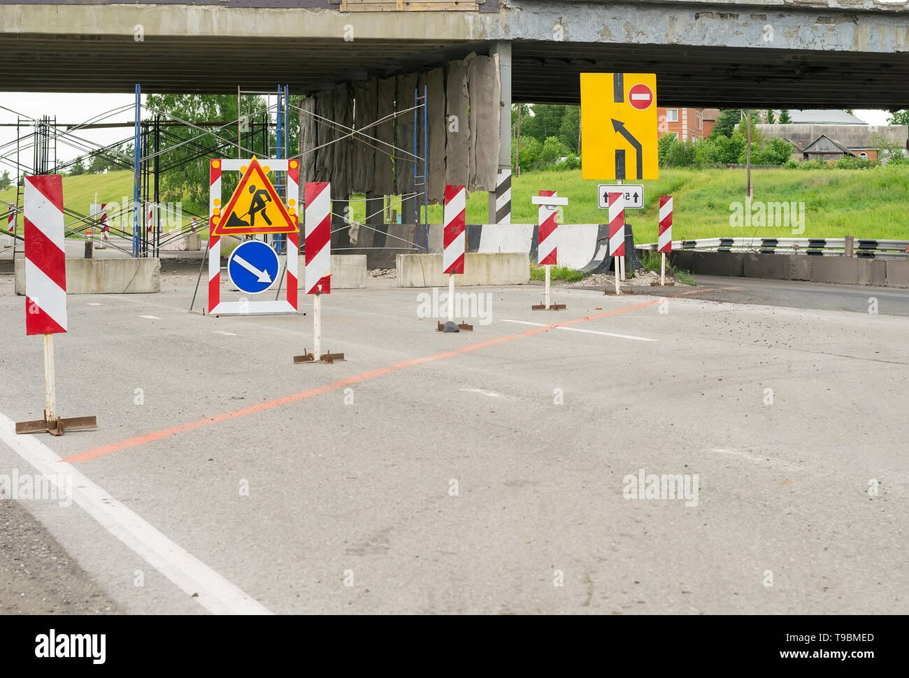 Road signs, detour, repair of the road on the asphalt bypass road near ...