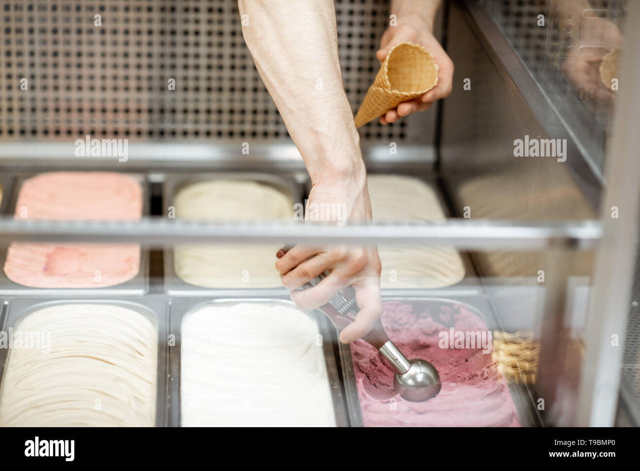 Person Scooping Ice Cream