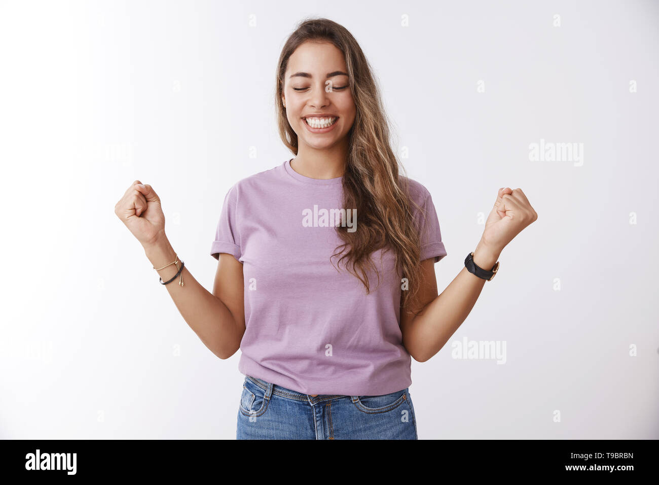 Oh yes finally victory. Happy relieved attractive charming female ...