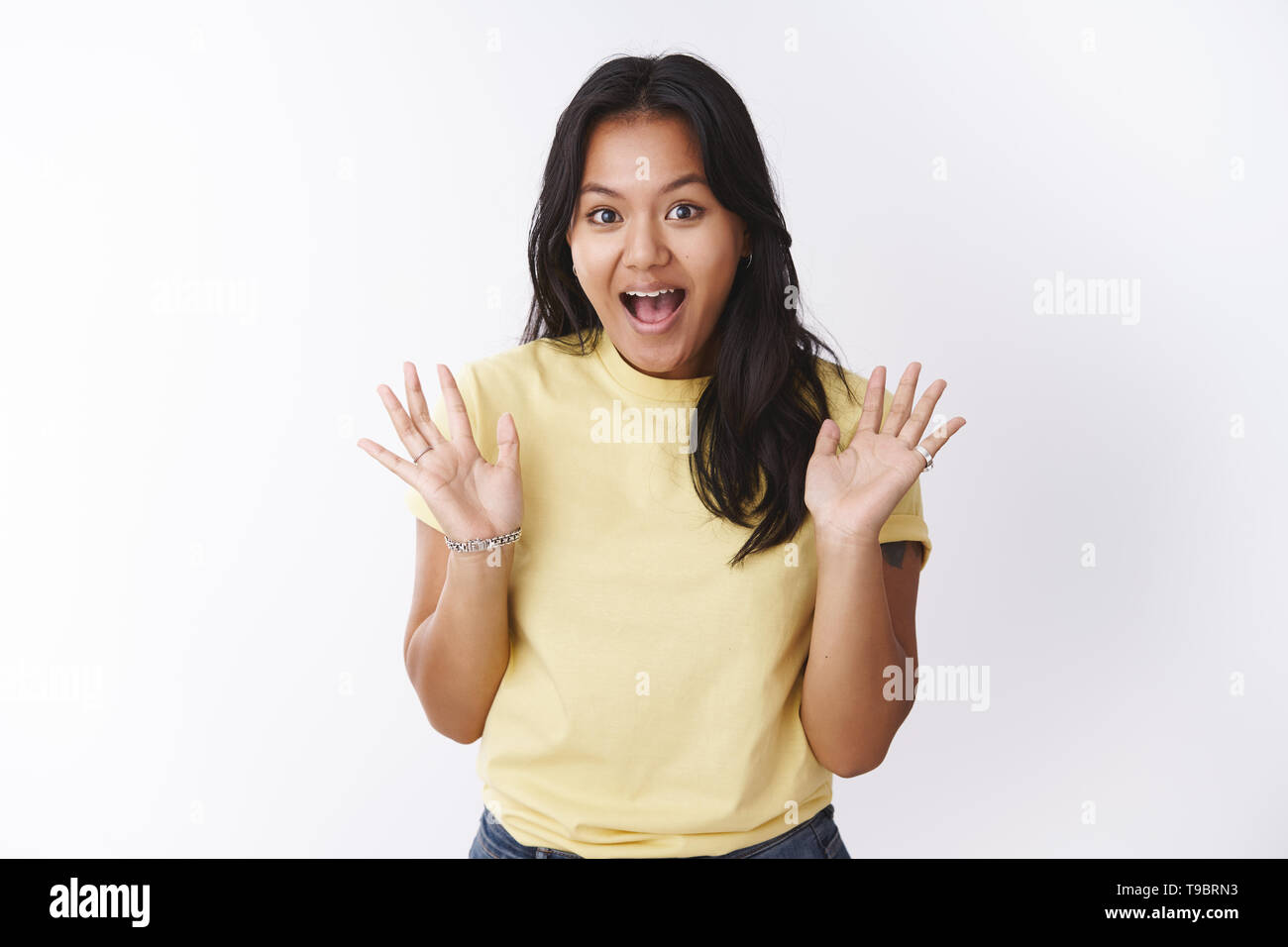 Girl making surprise arriving secretly to friend house yelling hello ...