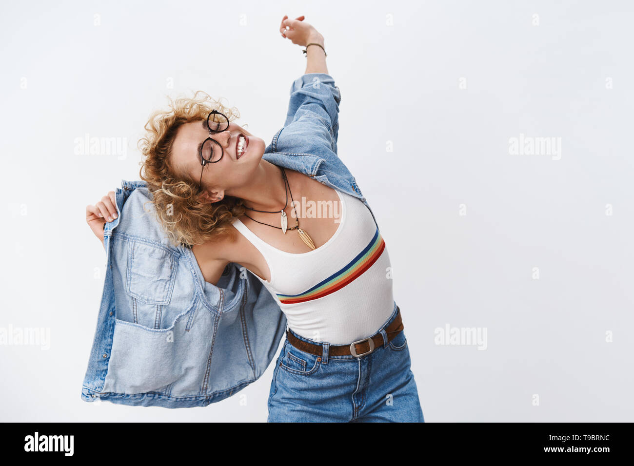 Oh yeah girl let her mind carry away dancing carefree listening music ...