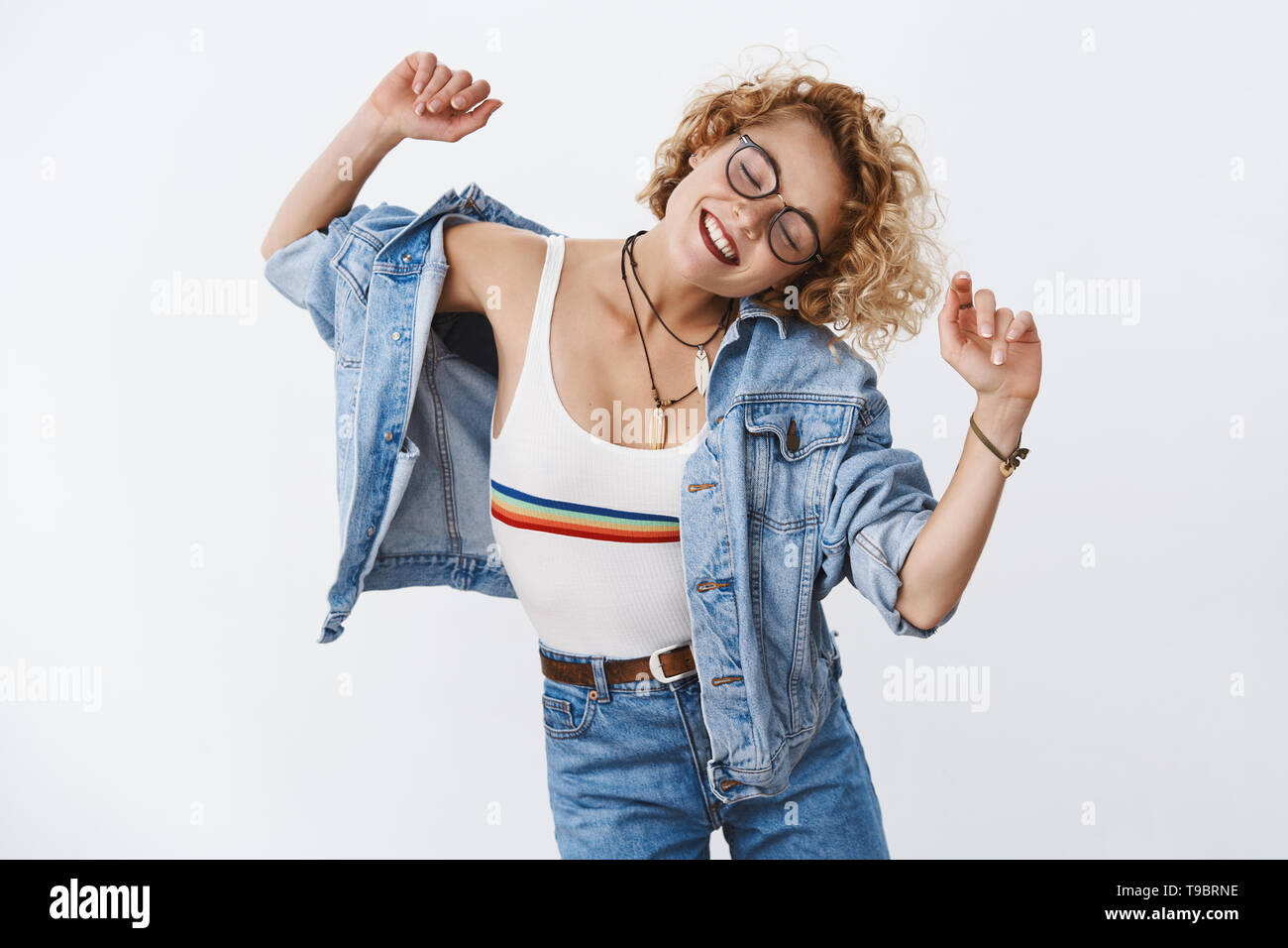 Favorite song on radio. Attractive young charismatic and stylish queer ...