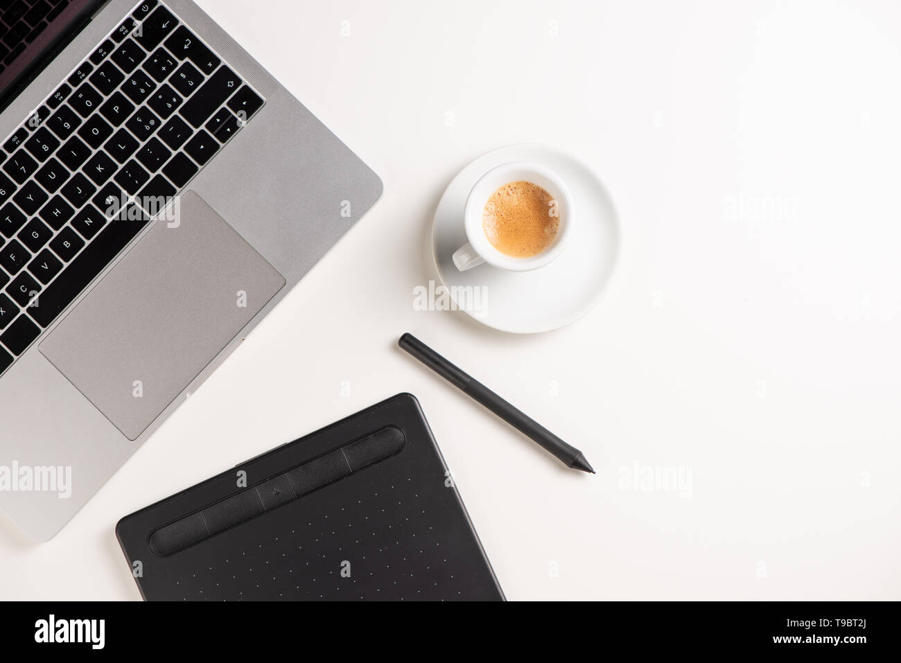 Graphic Designer white work table with computer and coffee. Desk top ...