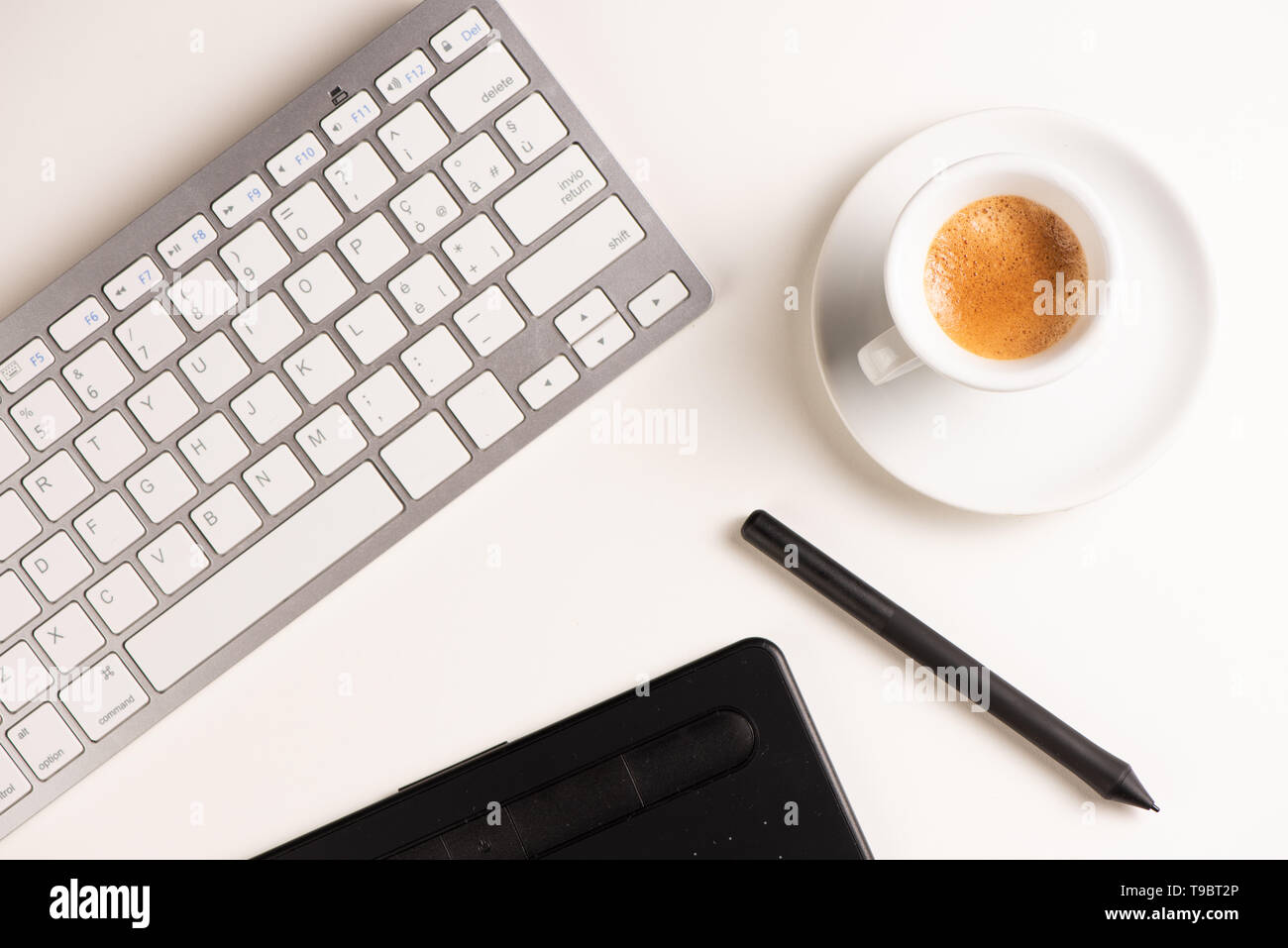 Graphic Designer white work table with computer and coffee. Desk top ...