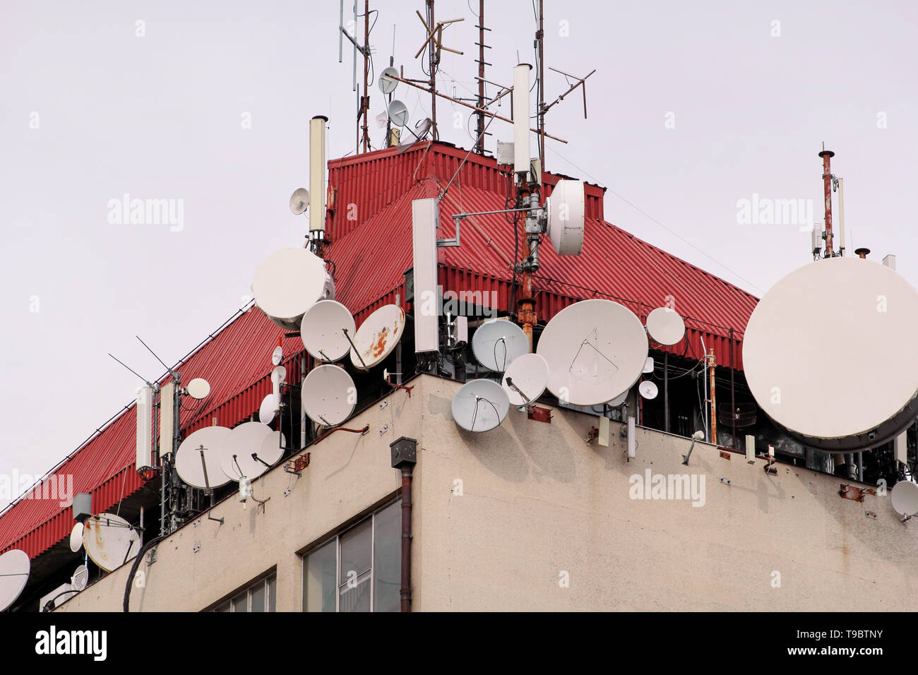 Telecommunication base stations network repeaters on the roof of ...