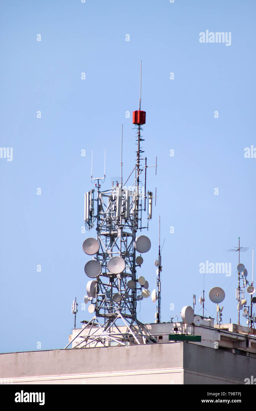 Telecommunication base stations network repeaters on the roof of ...