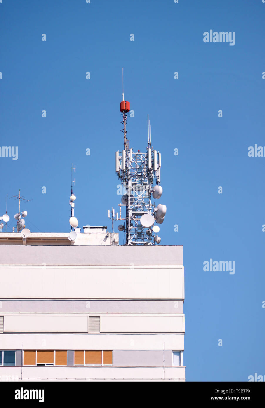 Telecommunication base stations network repeaters on the roof of ...
