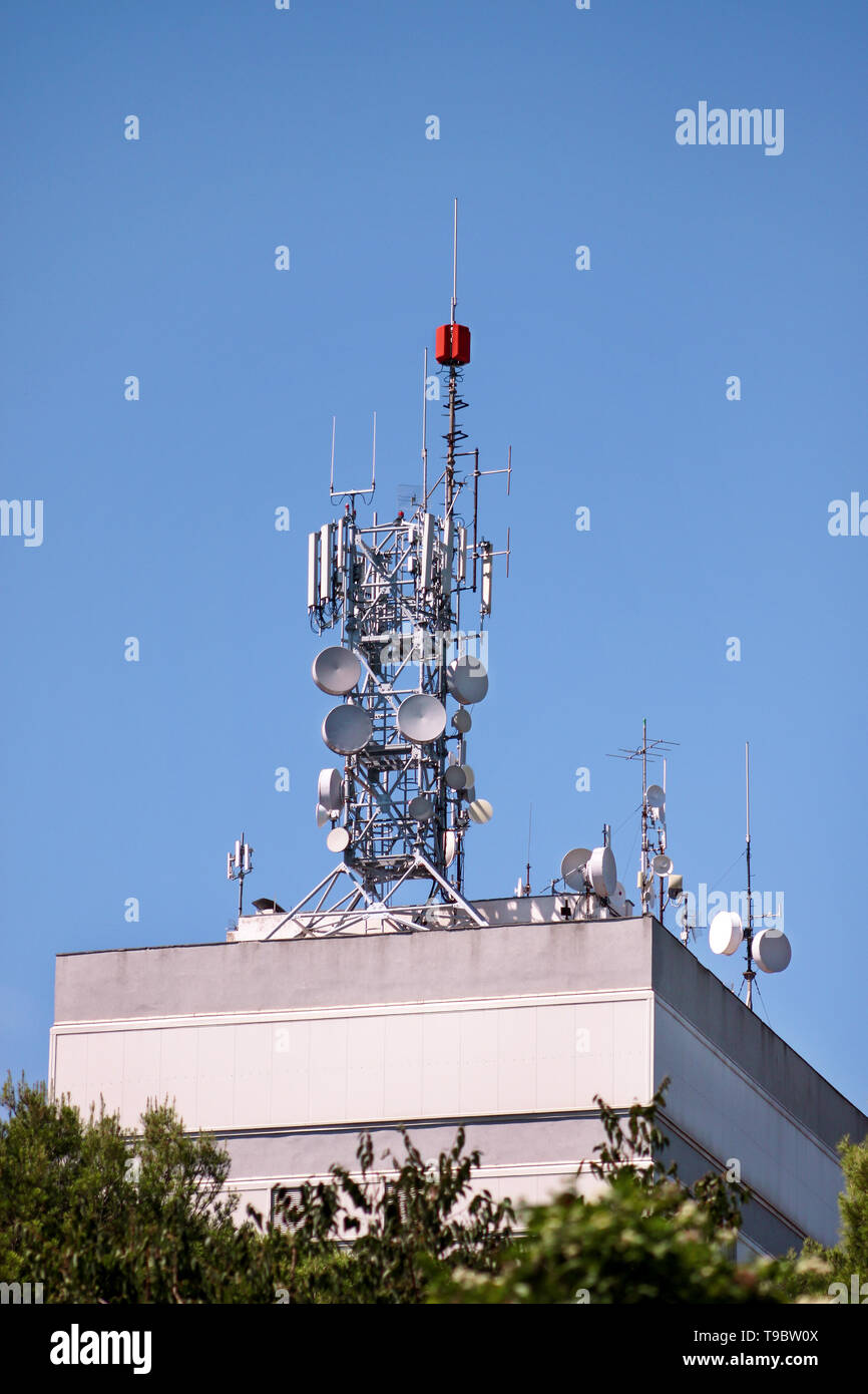 Telecommunication base stations network repeaters on the roof of ...