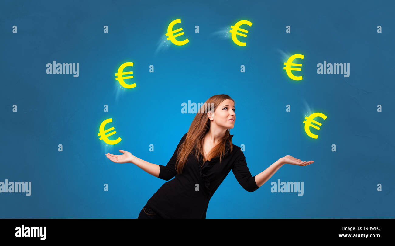 Young happy person juggle with euro symbol Stock Photo - Alamy