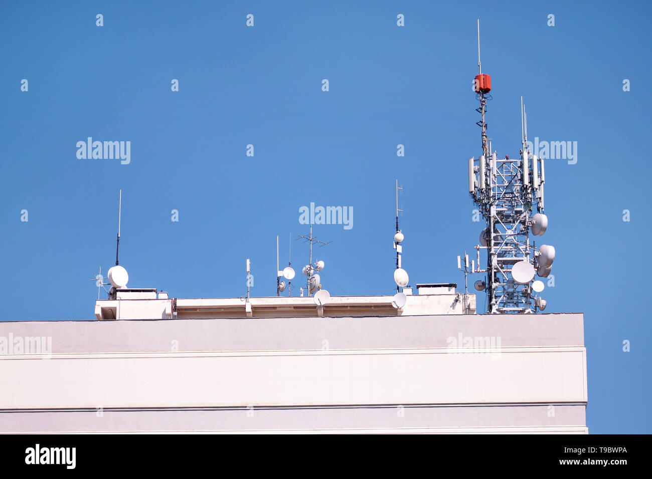 Telecommunication base stations network repeaters on the roof of ...