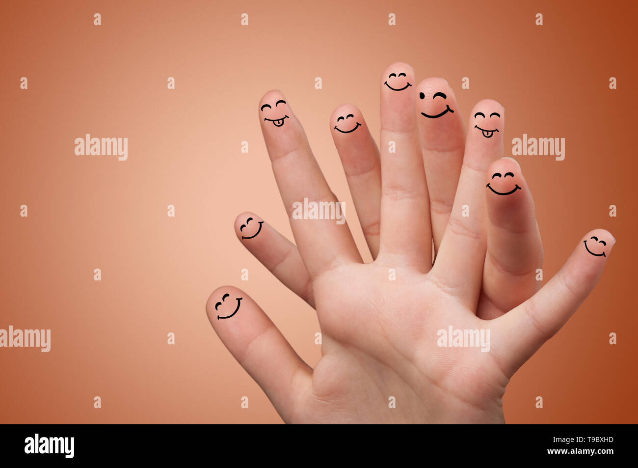Happy face fingers hugs each other Stock Photo - Alamy