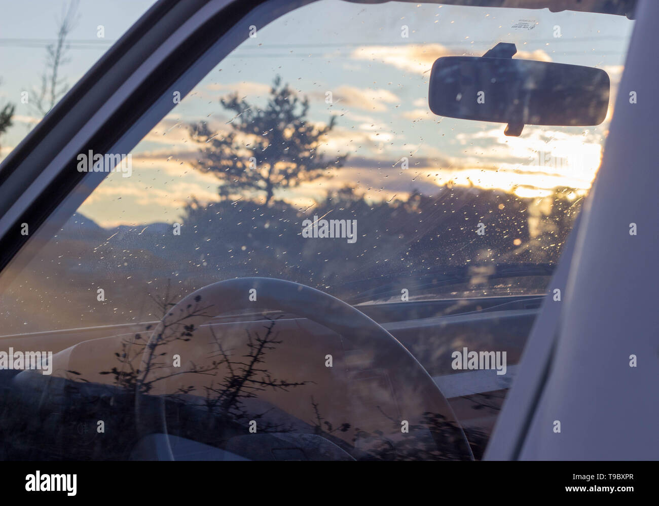 Sunset through car window Stock Photo - Alamy